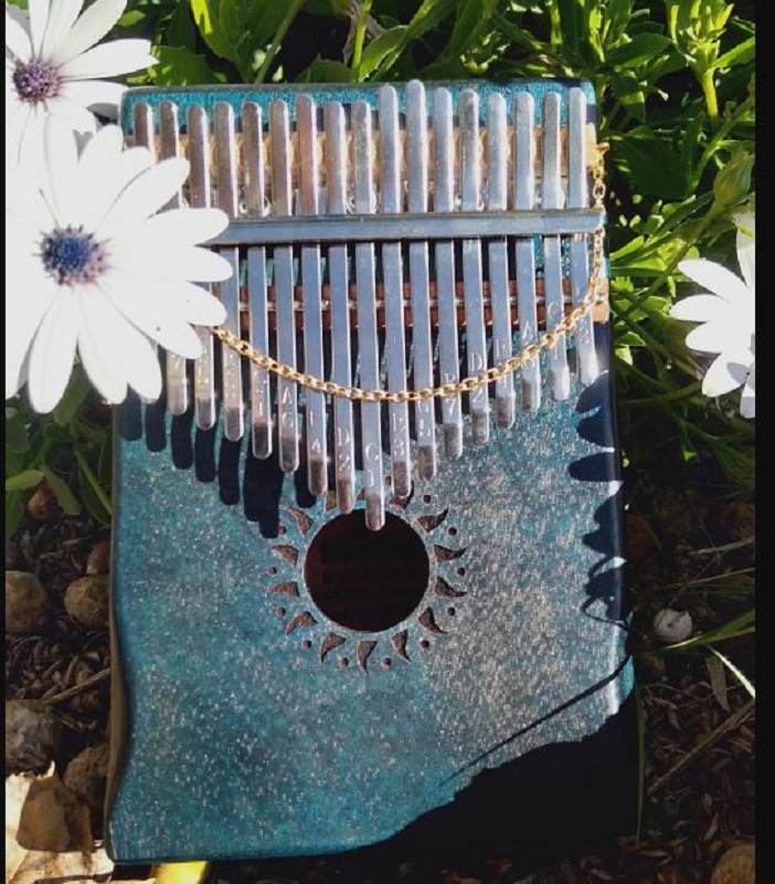 Golden Retriever Listens To Kalimba And Melts Hearts