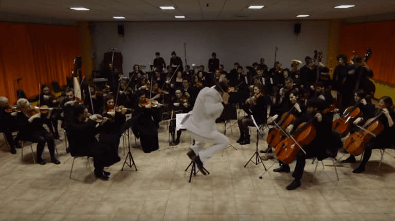 Orchestra director’s dance moves are just as exciting as the band’s ...