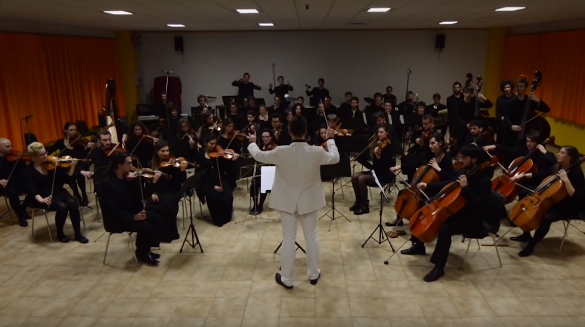 Orchestra director’s dance moves are just as exciting as the band’s ...