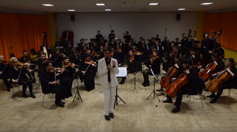 Orchestra director’s dance moves are just as exciting as the band’s ...