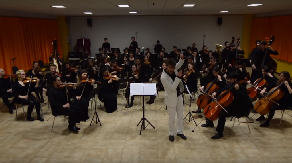 Orchestra director’s dance moves are just as exciting as the band’s ...