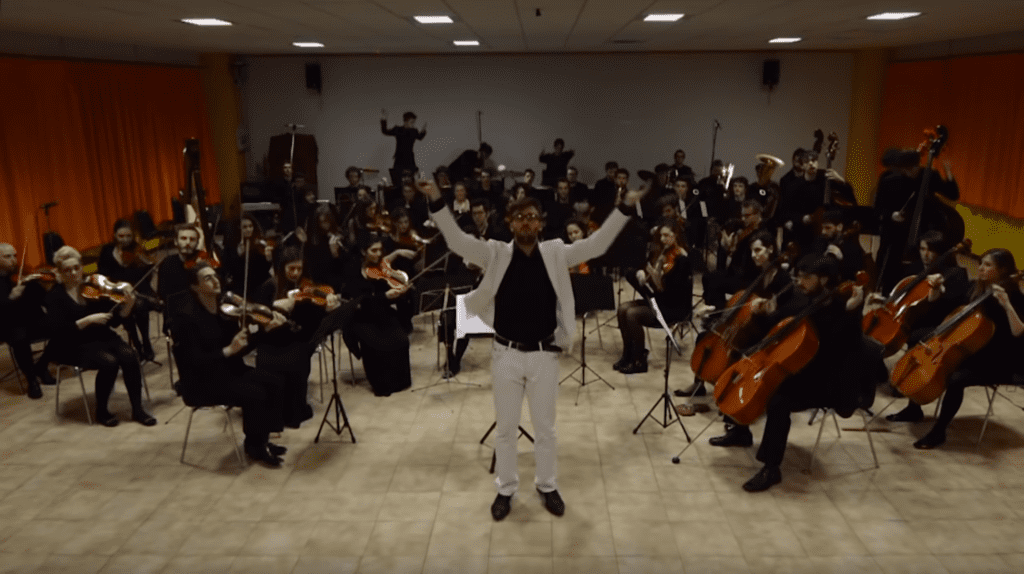 Orchestra director’s dance moves are just as exciting as the band’s ...