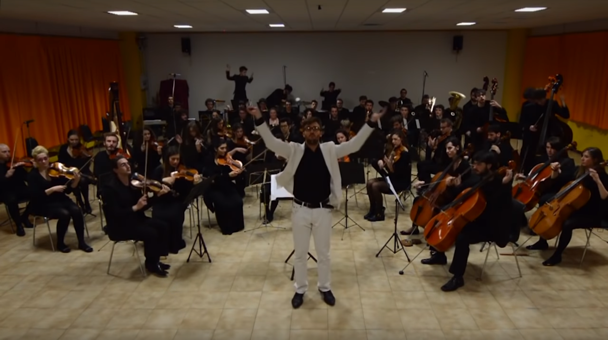 Orchestra director’s dance moves are just as exciting as the band’s ...