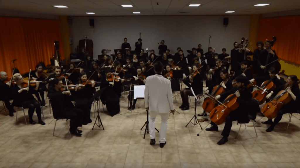 Orchestra director’s dance moves are just as exciting as the band’s ...