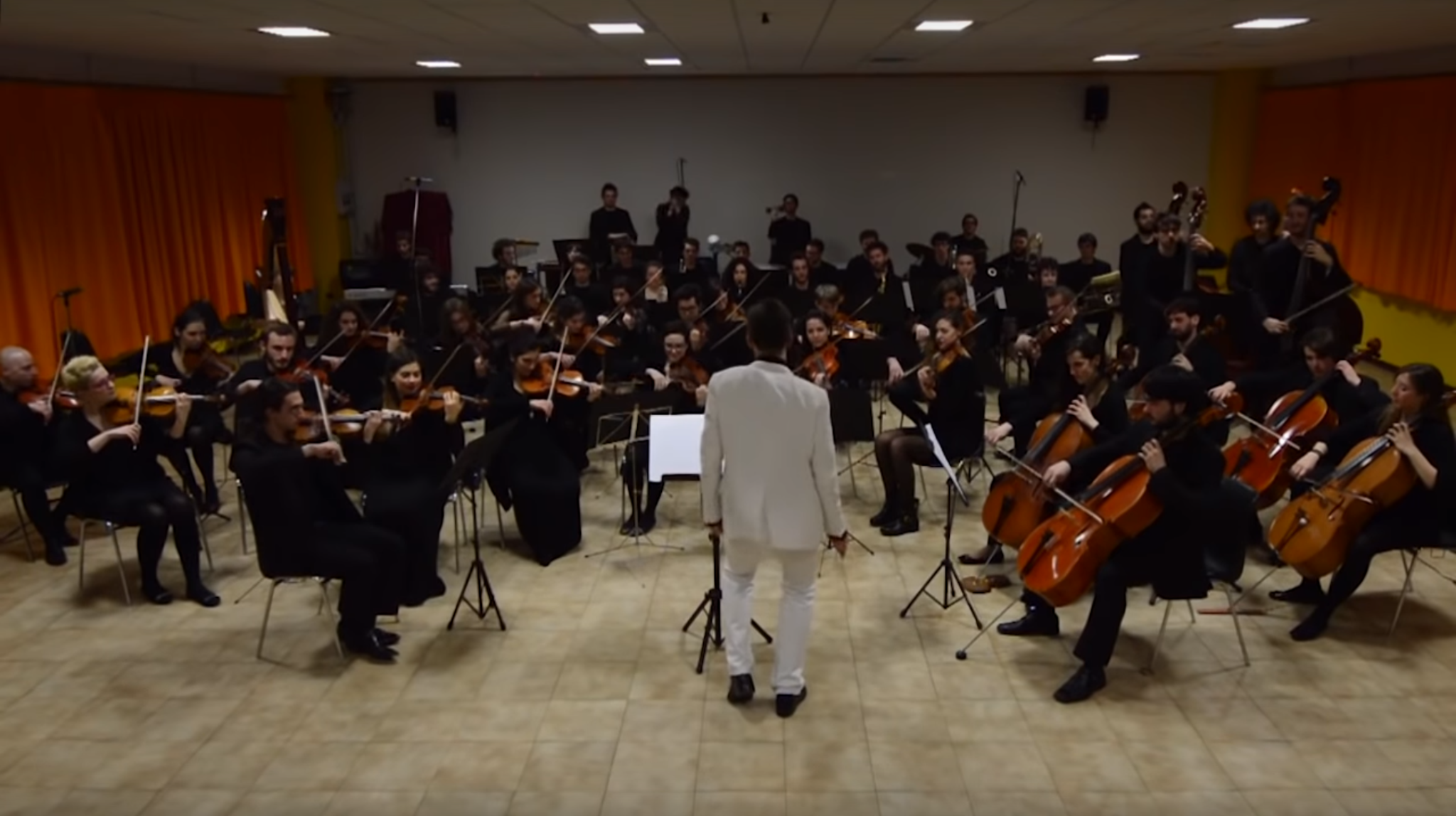 Orchestra director’s dance moves are just as exciting as the band’s ...