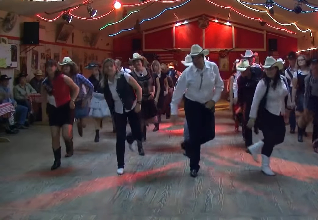 Cowboys and girls light up dance floor with fun dance routine