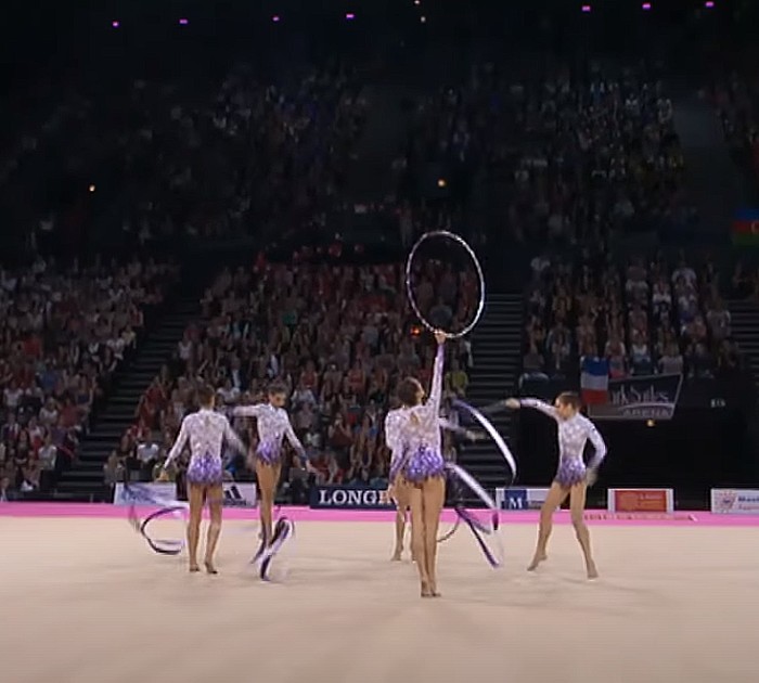 Gymnasts light up stage with brilliant rhythmic routines