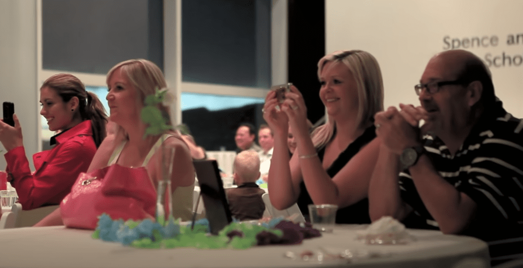 Daddy-daughter duo lets loose in front of guests when Bee Gees song ...