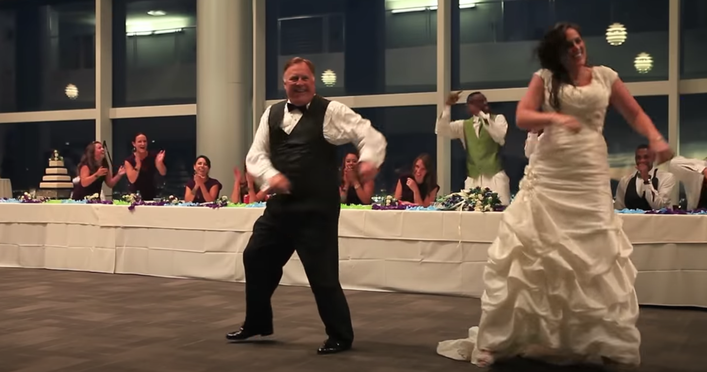 Daddy-daughter duo lets loose in front of guests when Bee Gees song ...