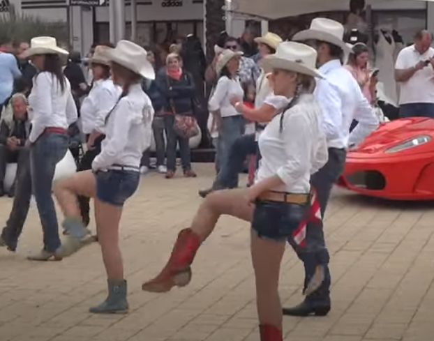 Cowboys And Girls Show Off Their Moves In Fun Line Dance