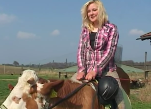 Teen Girl Teaches Cow To Jump As A Horse