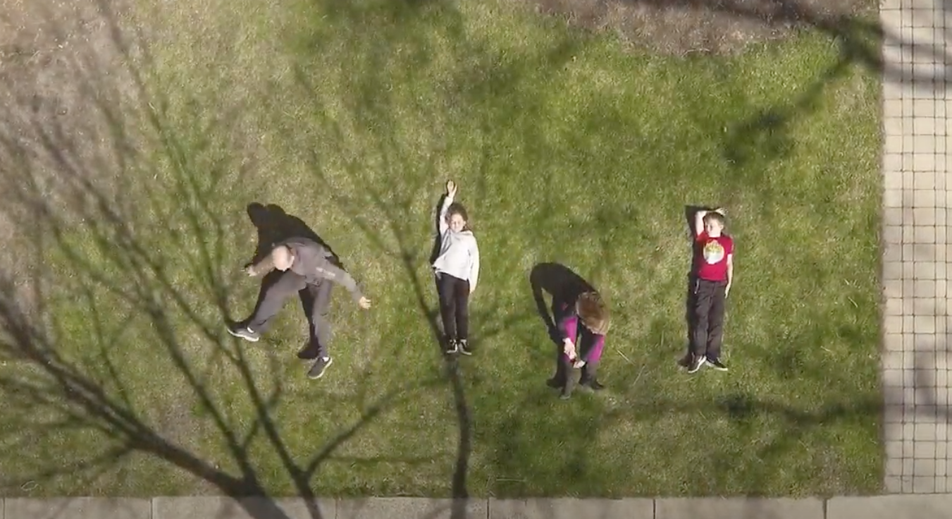 14 Families in Illinois film social distancing dance with a drone