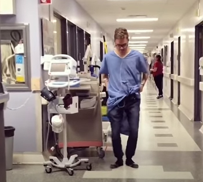 Man celebrates being discharged from hospital by breaking out in a ...