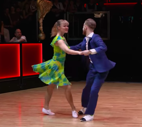 Young Couple’s Entertaining Dance Lights Up The Floor