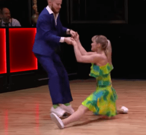 Young Couple’s Entertaining Dance Lights Up The Floor