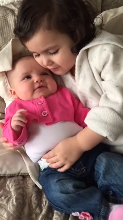 Big sister stops baby from crying when she sings sweetest ‘You Are My ...
