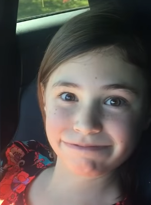 Young girl tells hilarious story of flirting with cute boy