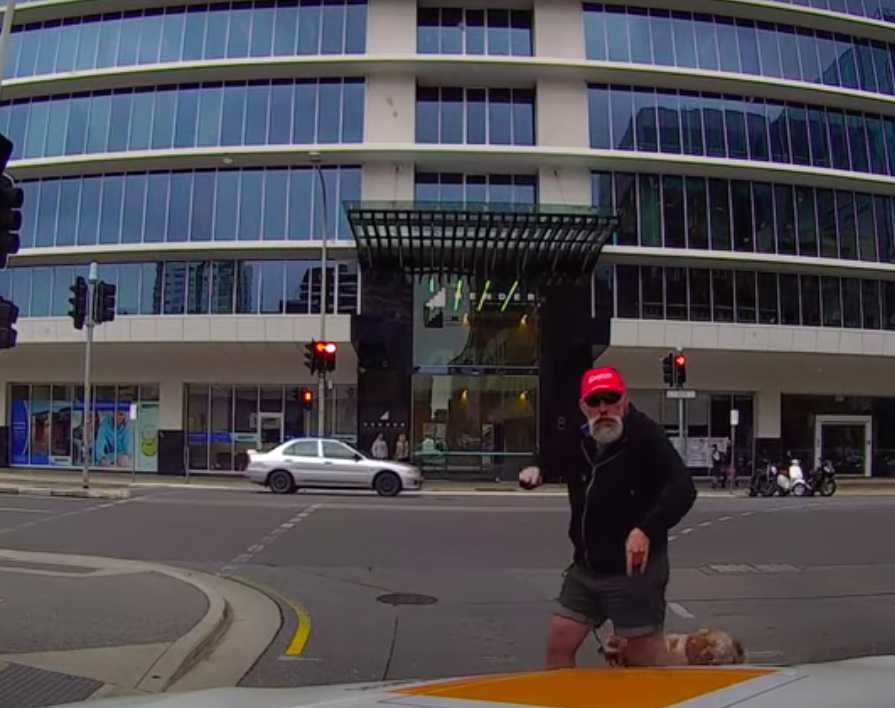 Angry Pedestrian Comes Face To Face With Karma