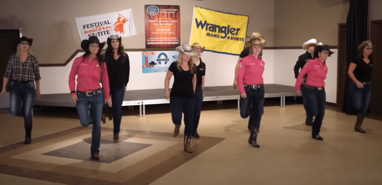 10 cowgirls show everyone how it's done with 'Cotton Eye Joe' dance