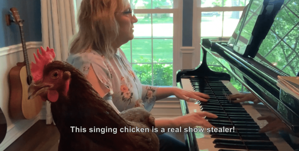 Chicken steals the show singing Disney classics when woman starts to play