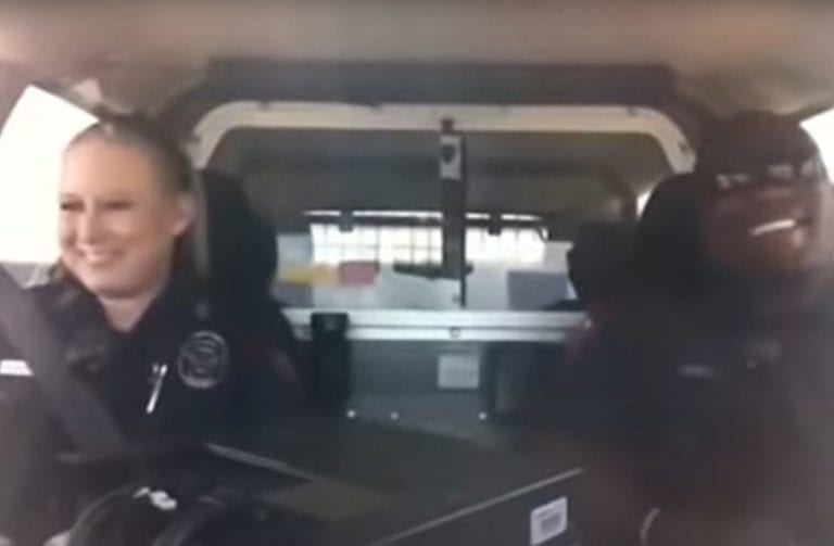 Camera catches cops lip-syncing on the job