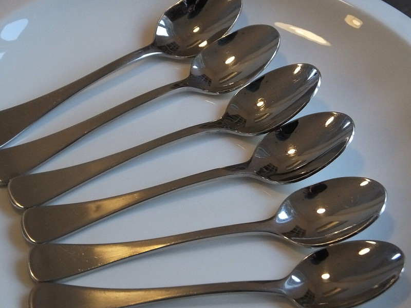 Spoon lady joins guitar player for bluegrass jam