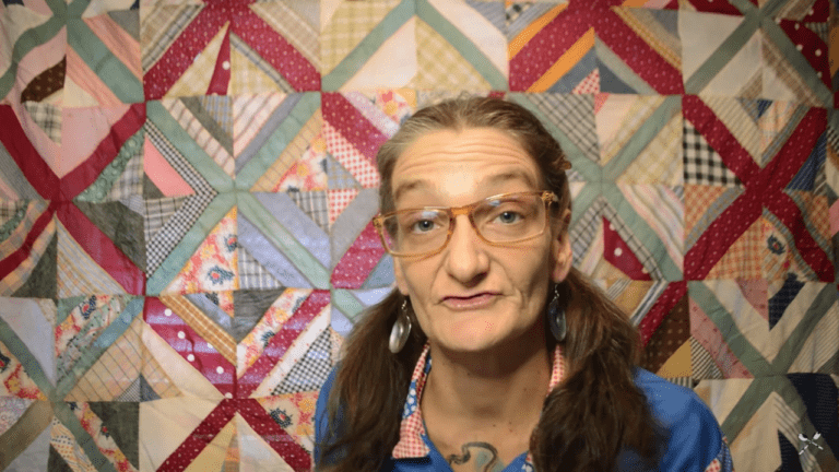 Spoon lady joins guitar player for bluegrass jam