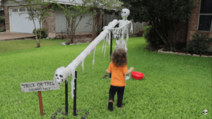 Couple crafts do-it-yourself ‘candy slide’ so that kids can trick-or ...