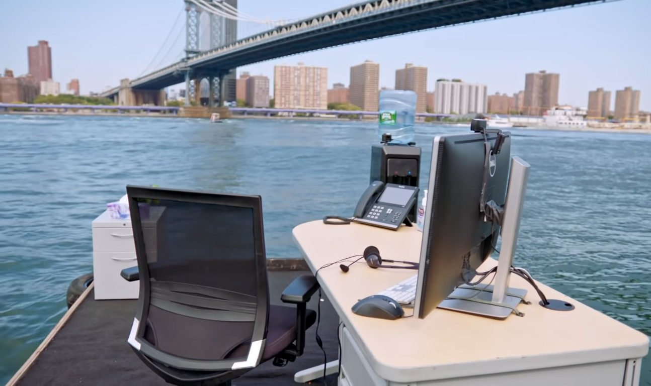 Man takes socially distancing very seriously with floating office