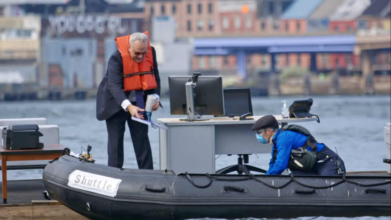 Man takes socially distancing very seriously with floating office
