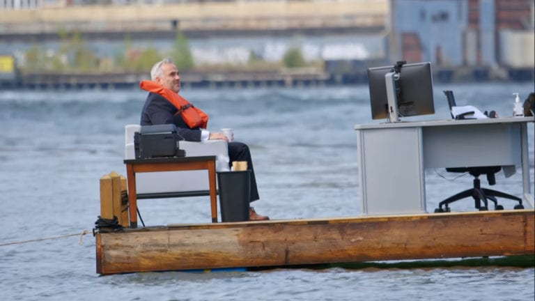 Man takes socially distancing very seriously with floating office