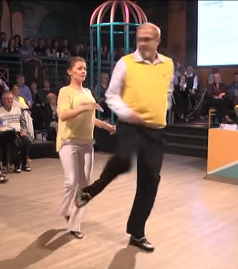 Couple don’t miss a beat when their legs starts flailing all over the ...