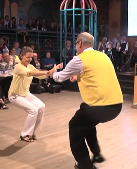 Couple don’t miss a beat when their legs starts flailing all over the ...