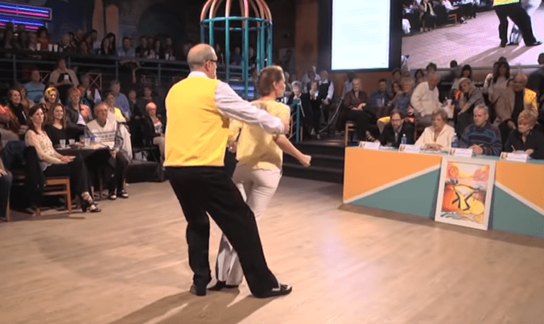 Couple don’t miss a beat when their legs starts flailing all over the ...