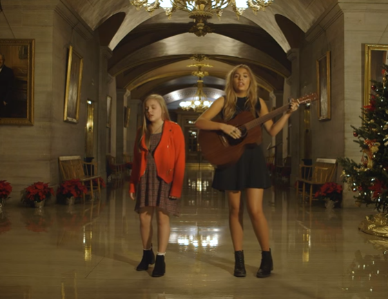 Sisters light up the room with angelic rendition of “Silent Night”