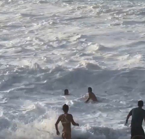 Professional surfer saves swimmer caught in strong ocean current before ...