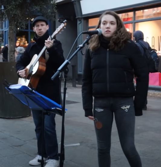 Busker Sings “Perfect” Until Young Man Steals Show Singing In Italian