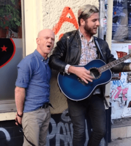 Busker plays song on the street completely unaware original singer is ...