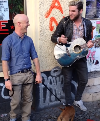 Busker plays song on the street completely unaware original singer is ...