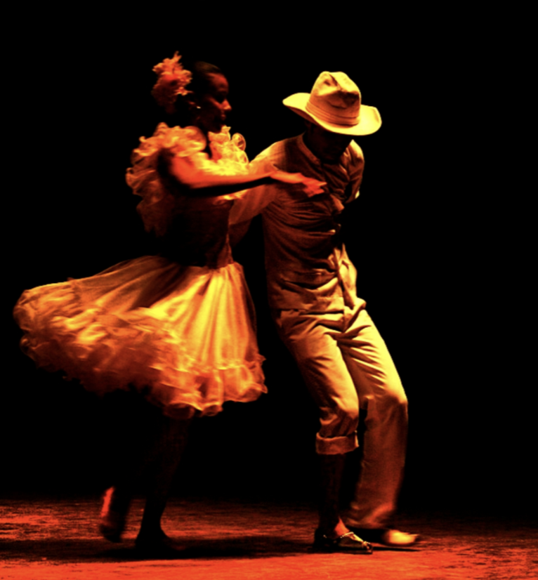 Couple kids take the stage and performs traditional colombian dance ...