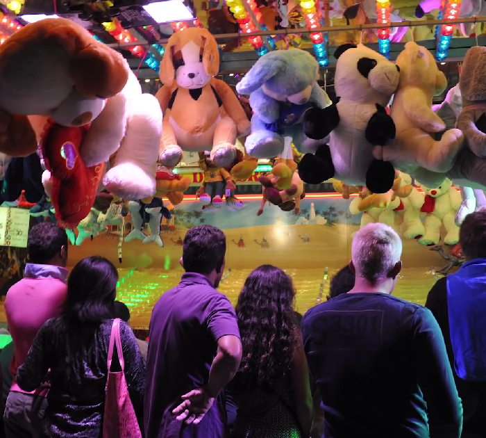 Man makes video showing the science behind carnival scams and gets over ...