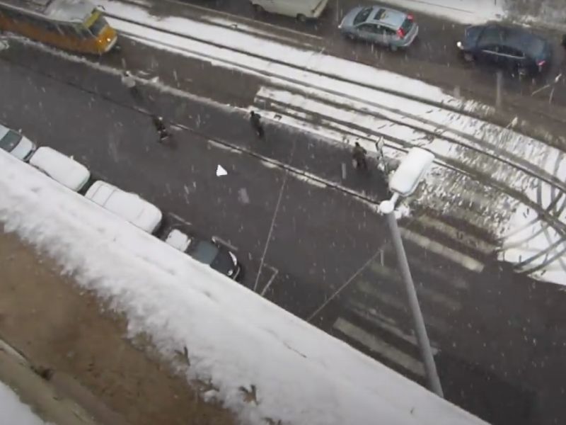 Paper plane makes perfect landing on moving train in the snow