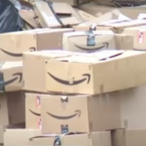 Worried neighbors confused as thousands of Amazon boxes pile up outside ...
