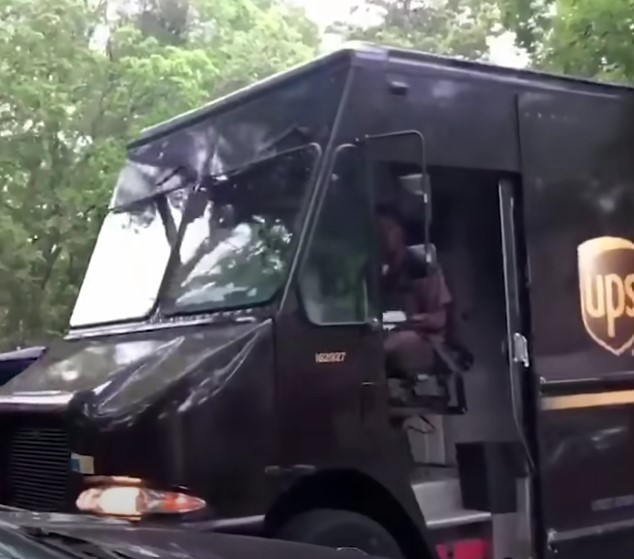 UPS driver is met by crowd of neighbors on the street for special ...