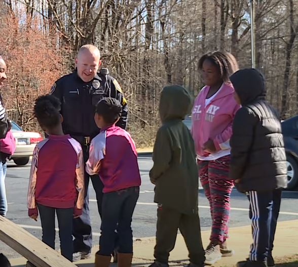 Police officer makes sure girls were safe then lays down to plays dolls ...