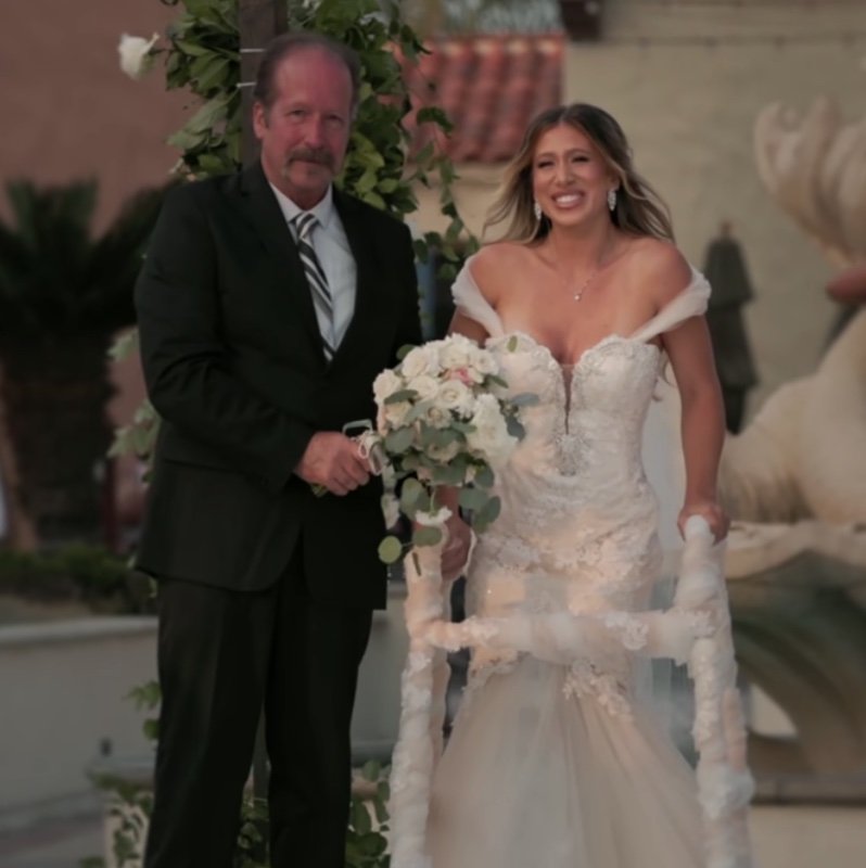 Groom chokes up seeing paralyzed bride walk down the aisle