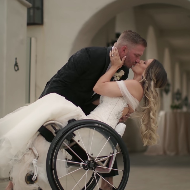 Groom chokes up seeing paralyzed bride walk down the aisle