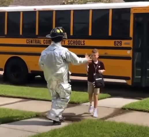 Big brother loves to embarrass little brother at bus stop every day