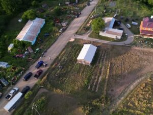 Group of Amish men move entire building using only their brute strength