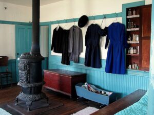 Group of Amish men move entire building using only their brute strength